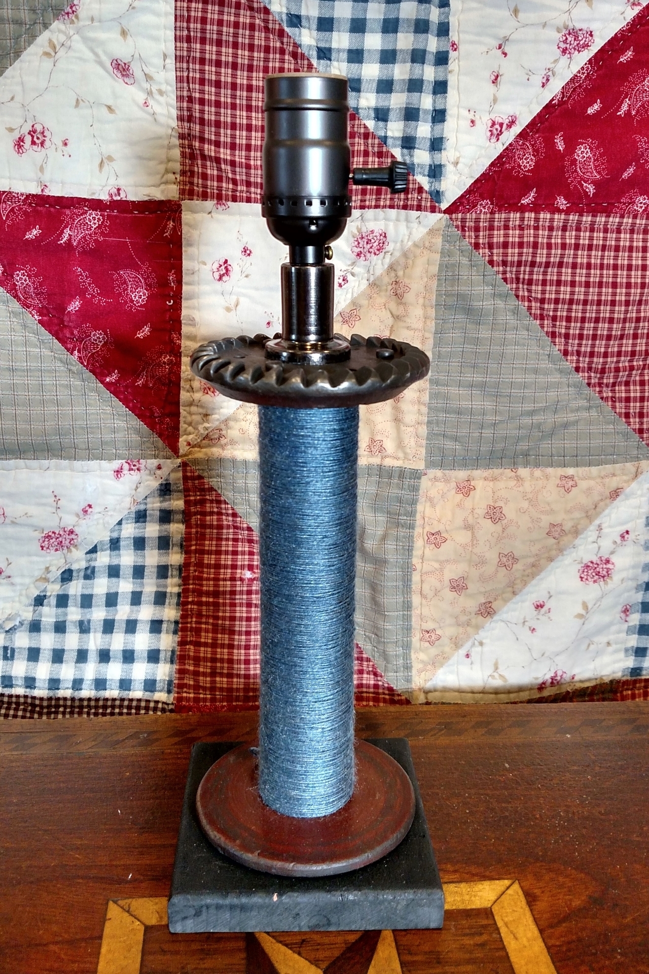 Cute Lamp made with a vintage Bobbin with a metal "gear" top.