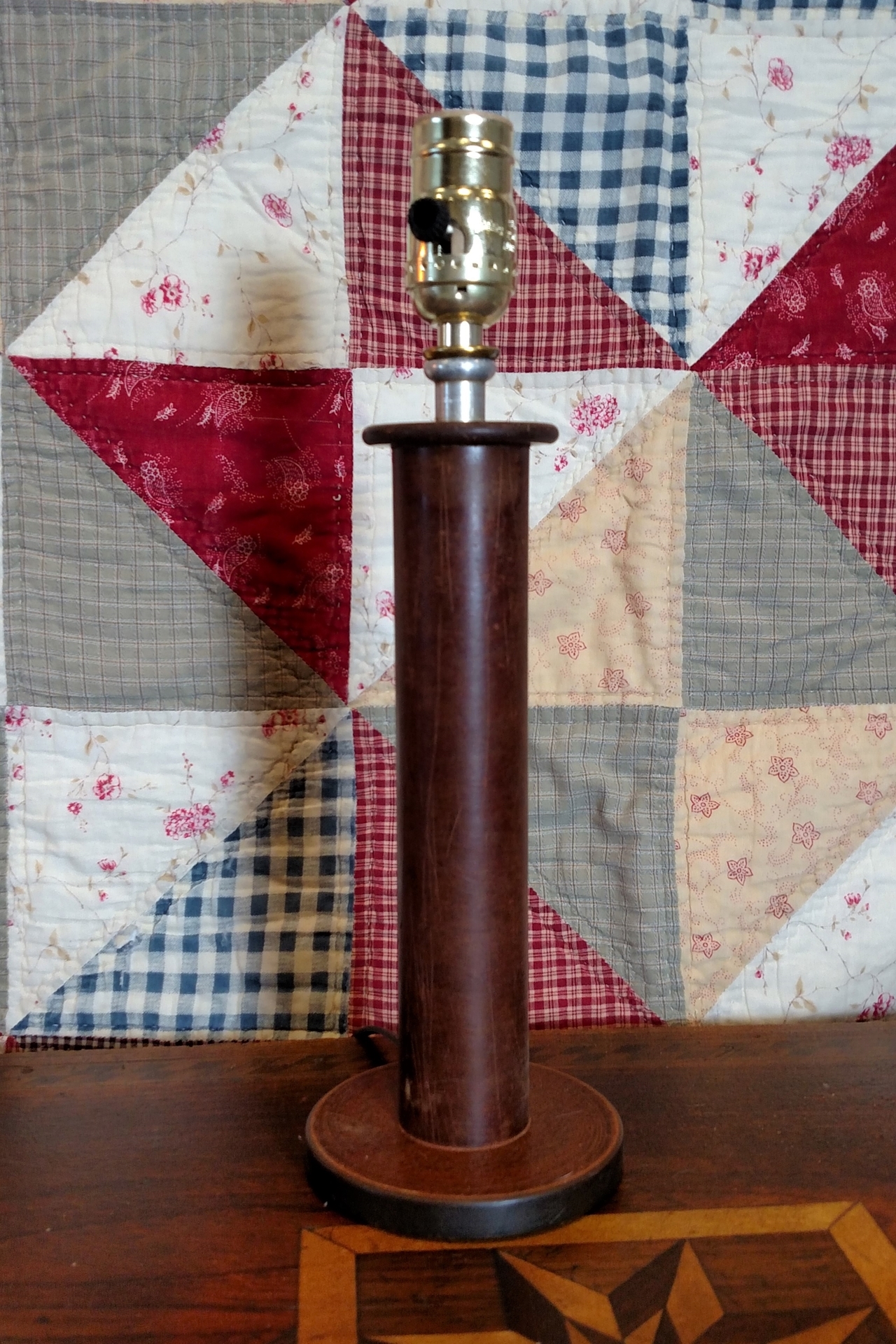 Cute Lamp made with a Vintage Bobbin with a small bobbin rim at the top ...