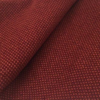 A tweedy textured wool with rich deep red with light red, too