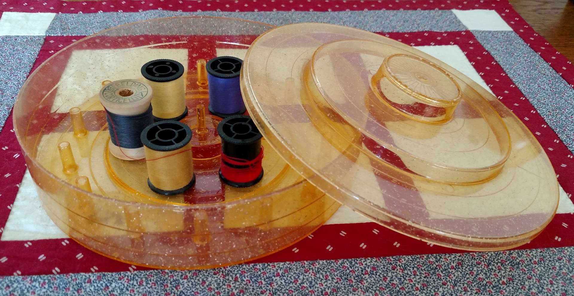 Warm Gold/orange Plastic Spool caddy with retro flair