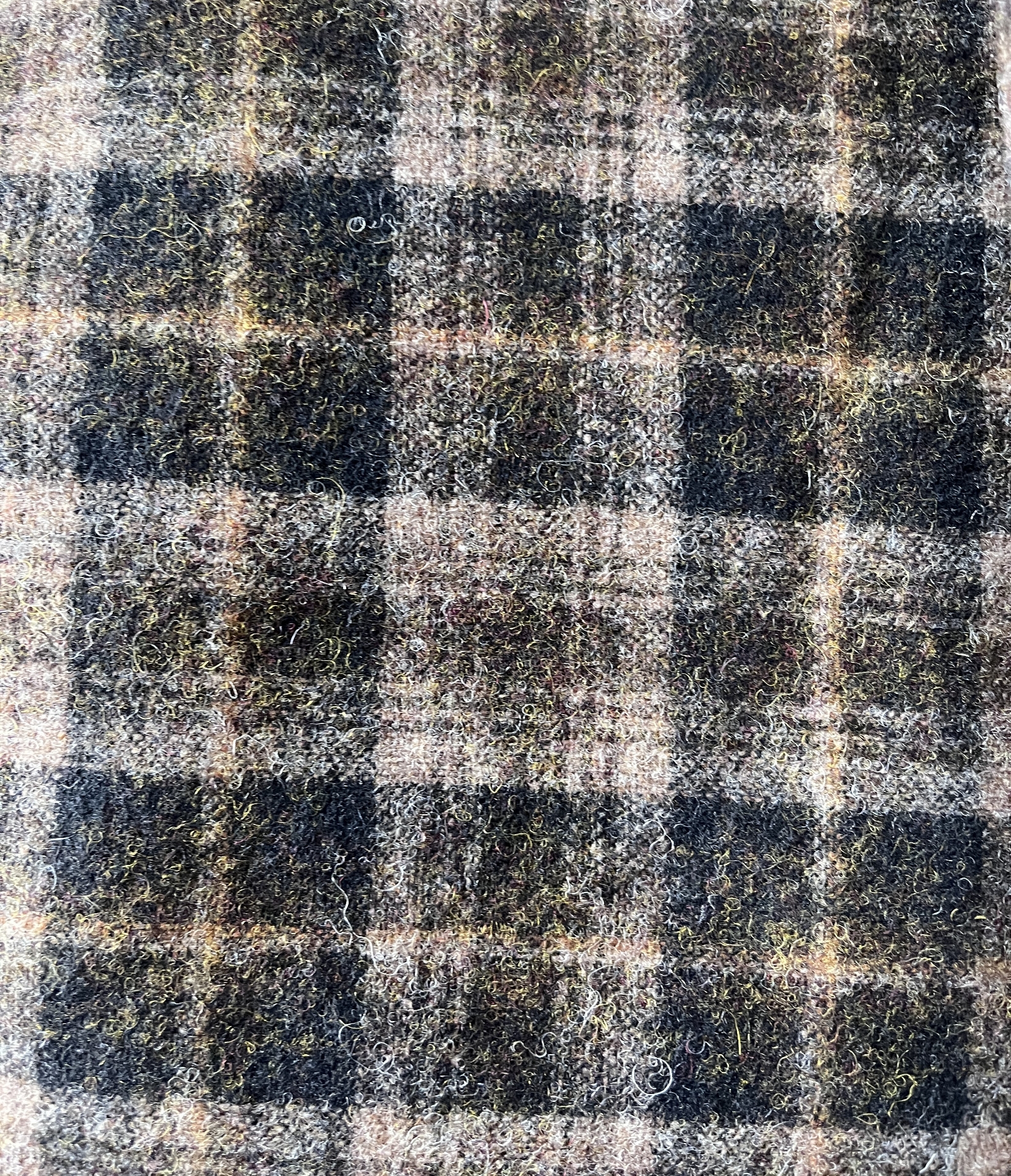 A beautiful textured wool. The wool is pre-felted and 13 oz weight.