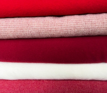 A beautiful textured wool. The wool is pre-felted and 13 oz weight.